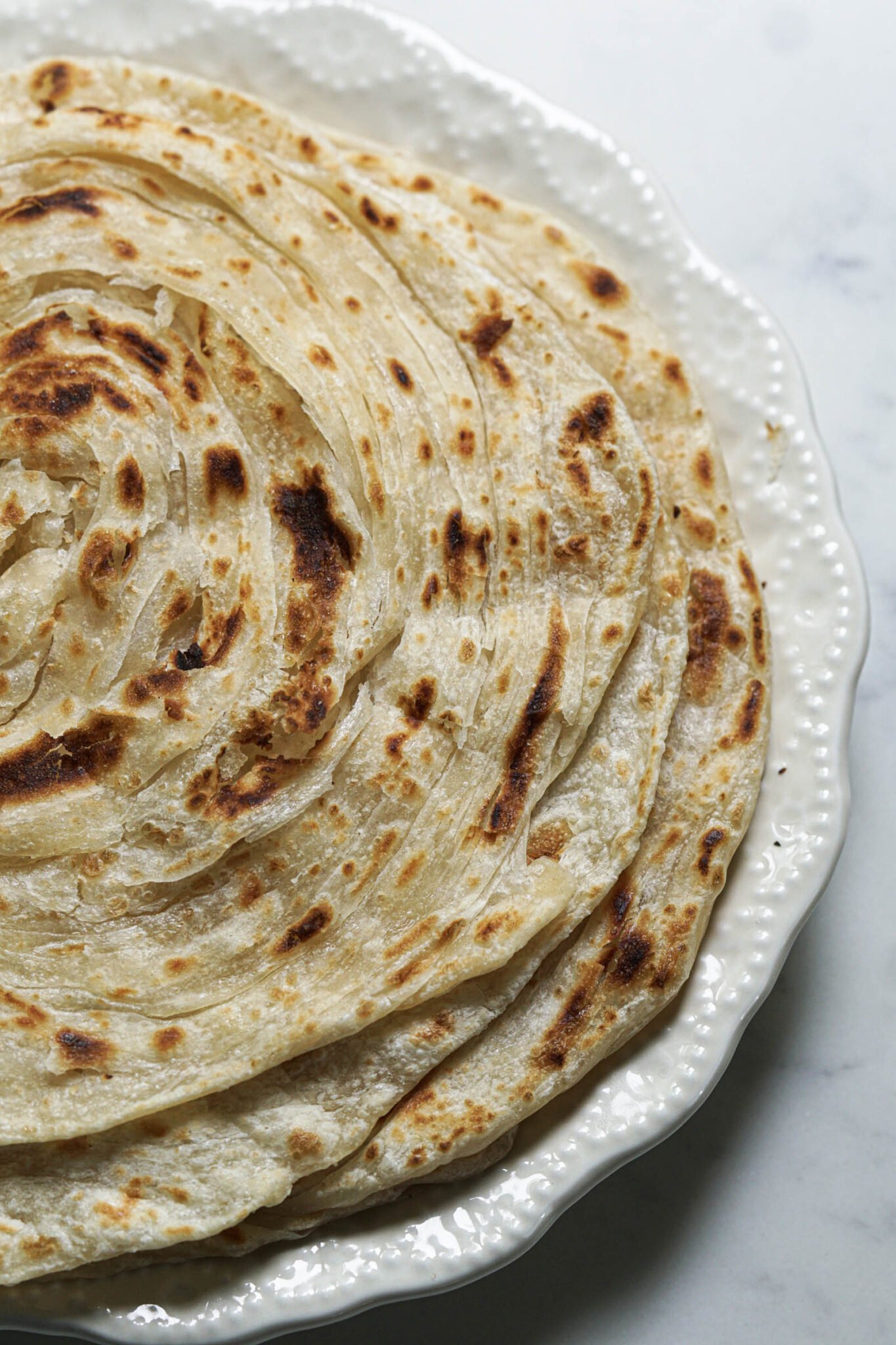 Flaky Malabar Paratha or Kerala Parotta - Some Indian Girl